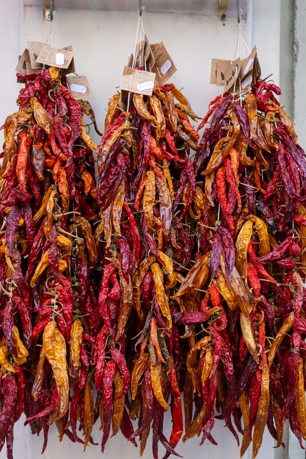 Yellow and Red Chilli Peppers To Dry on the Wall for a Long Time Stock ...