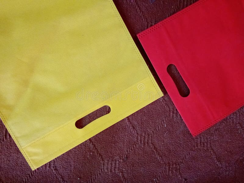 Yellow & Red Color D Cut Eco Friendly Bags Stock Photo - Image of ...