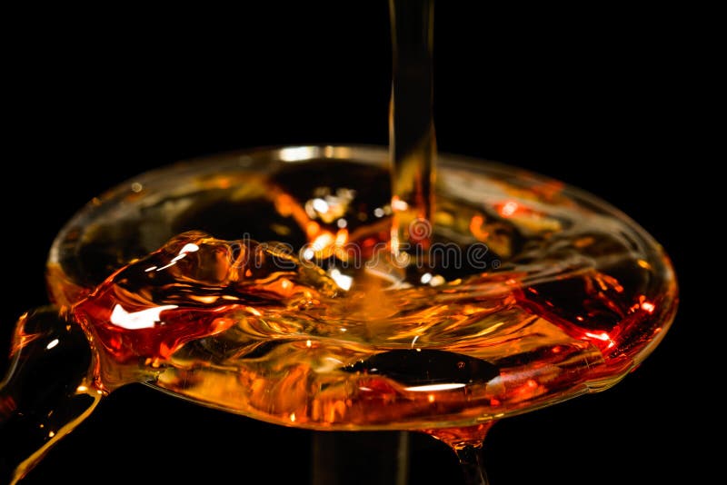 Yellow and Red Liquid Pouring Macro Stock Image - Image of golden, cool ...