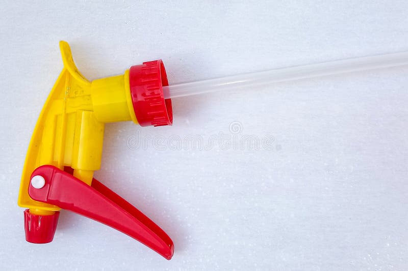 Yellow and Red Plastic Sprayer Trigger Cap on White Background Stock ...