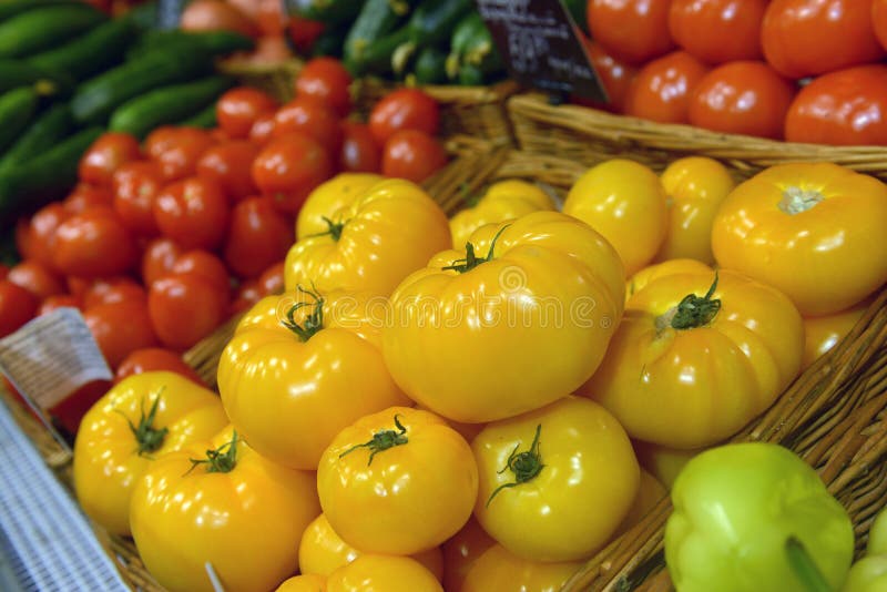 Yellow and Red Tomatoes on Display Stock Image - Image of greengrocer ...