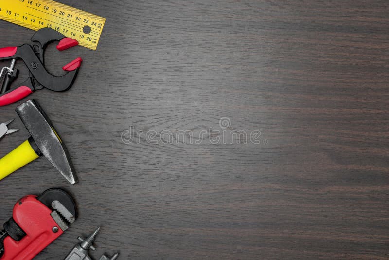 Yellow and Red Tool Set on Wooden Table Stock Photo - Image of used ...