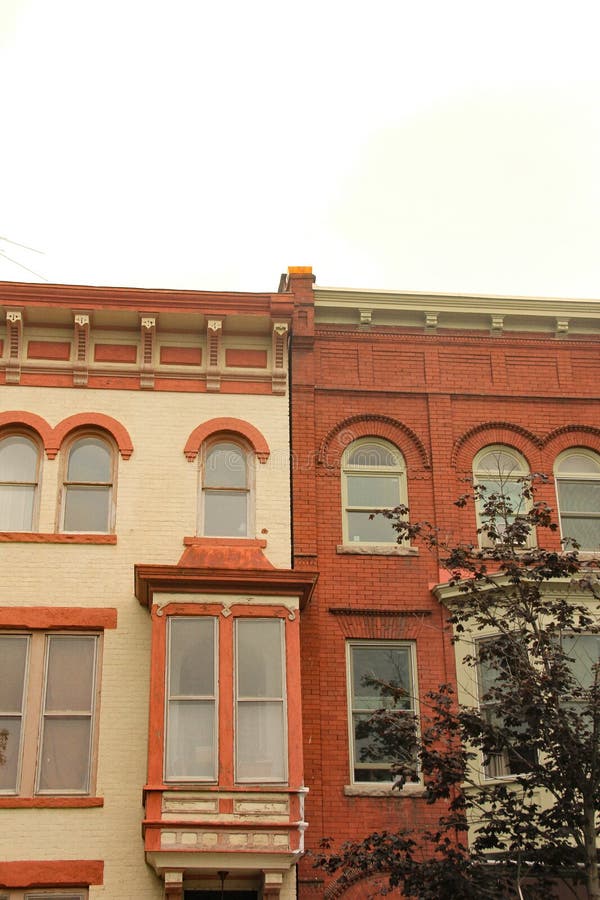 Yellow and Red Townhouse in Row Stock Photo - Image of escape ...