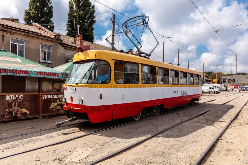 A Yellow and Red Train is Parked on the Tracks Editorial Stock Photo ...