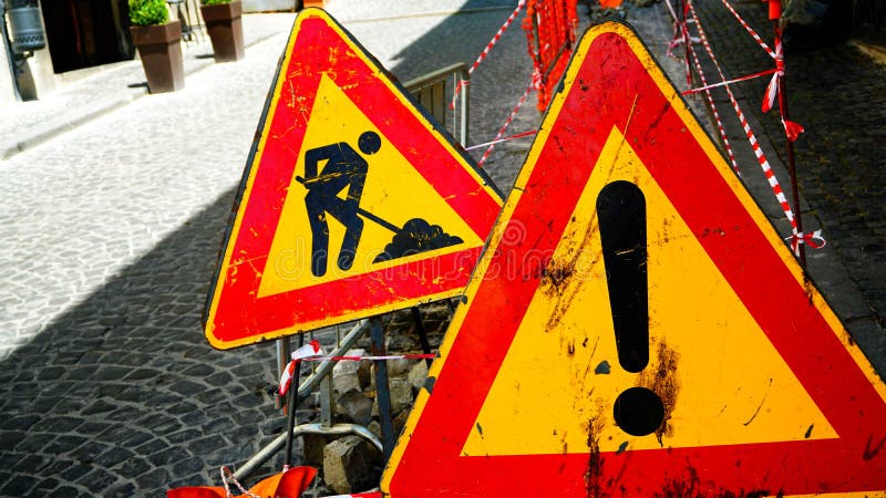 Yellow and Red Triangular Signs of Work in Progress in a City Street ...