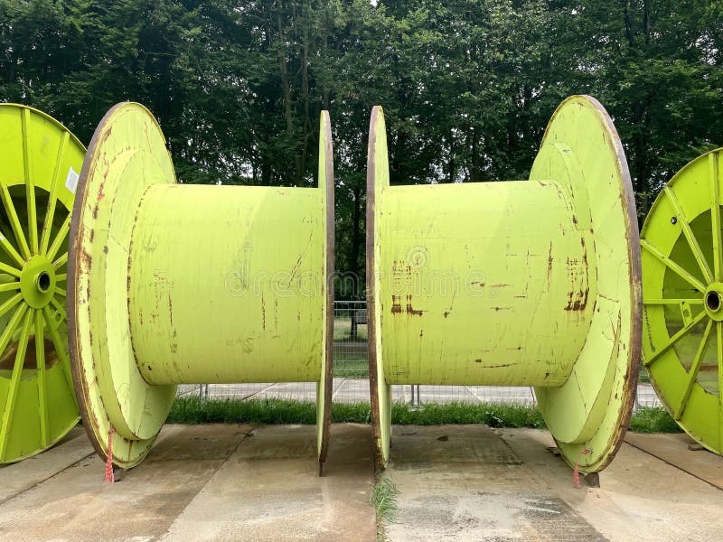 Reels on Cement with Green Rims Stock Image - Image of spools, reels ...