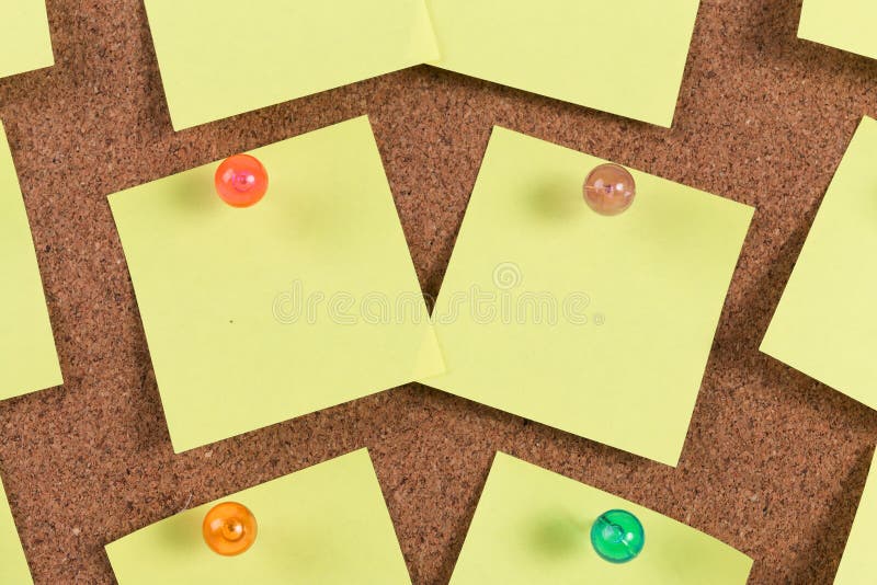 Yellow Reminder Sticky Note on Cork Board Stock Photo - Image of ...