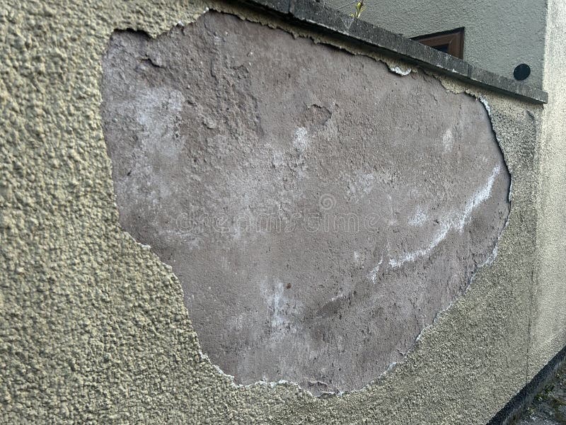 Yellow Rendered Wall with Large Area of Broken Render Stock Photo ...