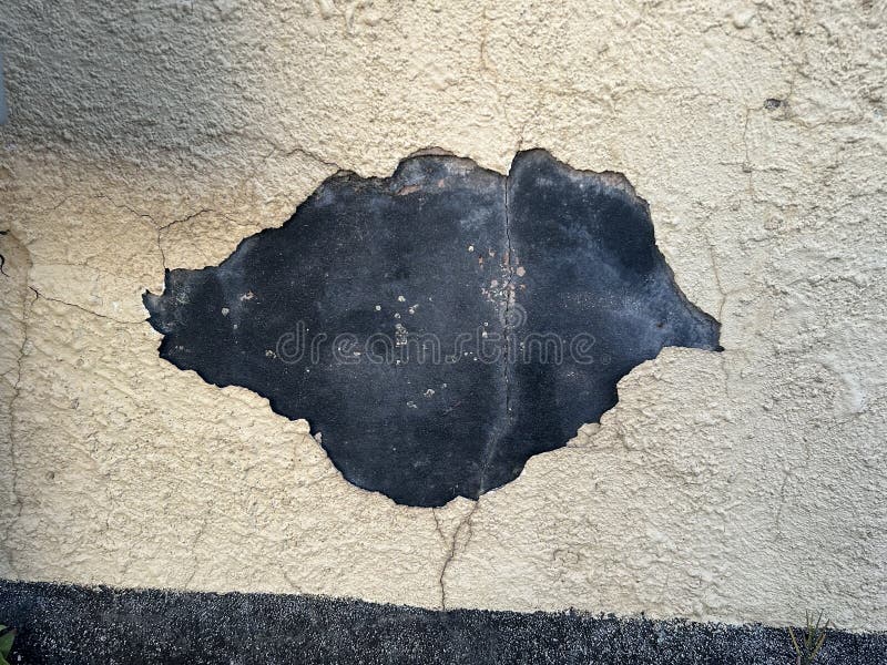 Yellow Rendered Wall with Large Area of Broken Render Stock Photo ...