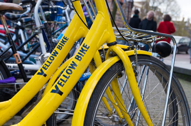 Yellow rental bikes editorial stock photo. Image of cityscape - 55443538