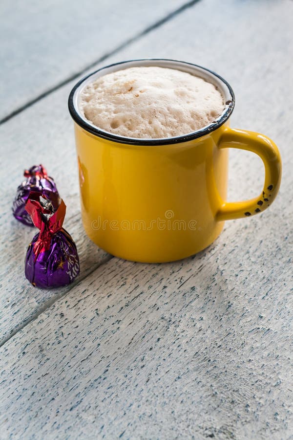 Yellow Retro Cup and Chocolate Candies Stock Image - Image of ...
