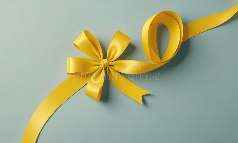 Yellow Ribbon with Bow is Arranged Diagonally on Light Blue Background ...