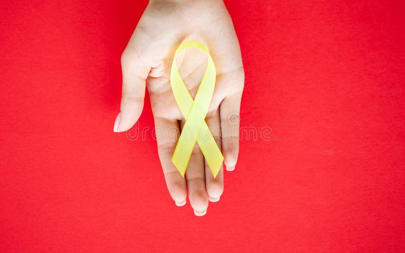 Yellow Ribbon in Hands, Symbol Bladder Cancer Stock Image - Image of ...