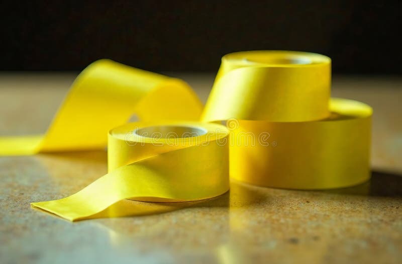 Yellow Ribbon for Packaging Present, Workplace Desk in Office. AI ...