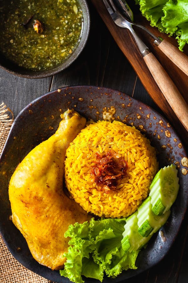 Yellow rice with chicken stock photo. Image of dish - 117491368