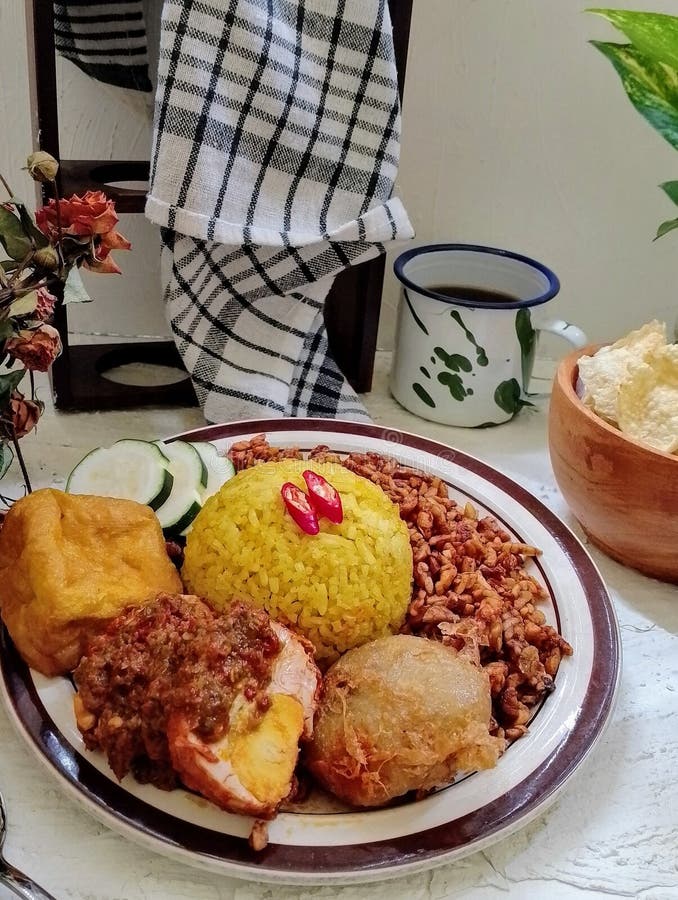 Yellow Rice Complete with Side Dishes Stock Image - Image of yellow ...