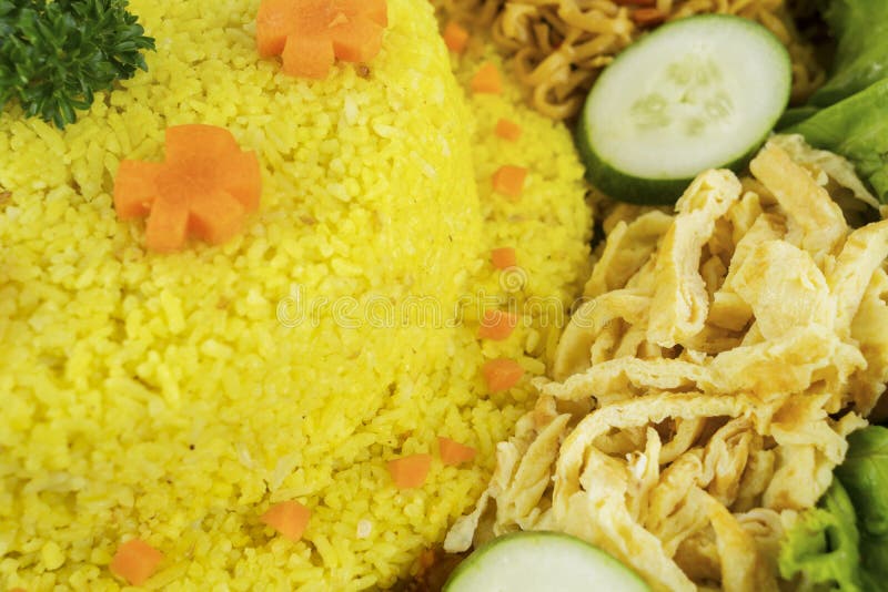 Yellow Rice with Cucumber and Scrambled Egg Stock Photo - Image of ...