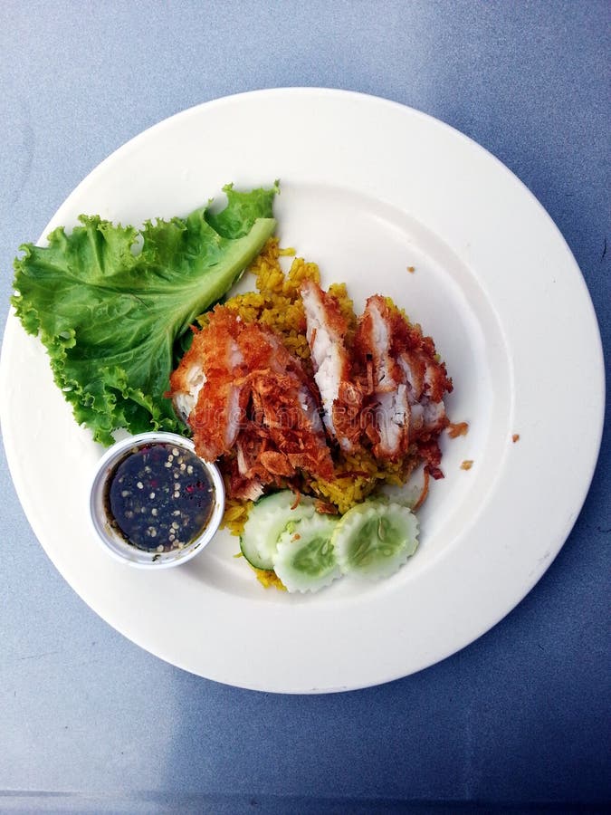 Yellow Rice with Fried Chicken Stock Image - Image of eats, chicken ...