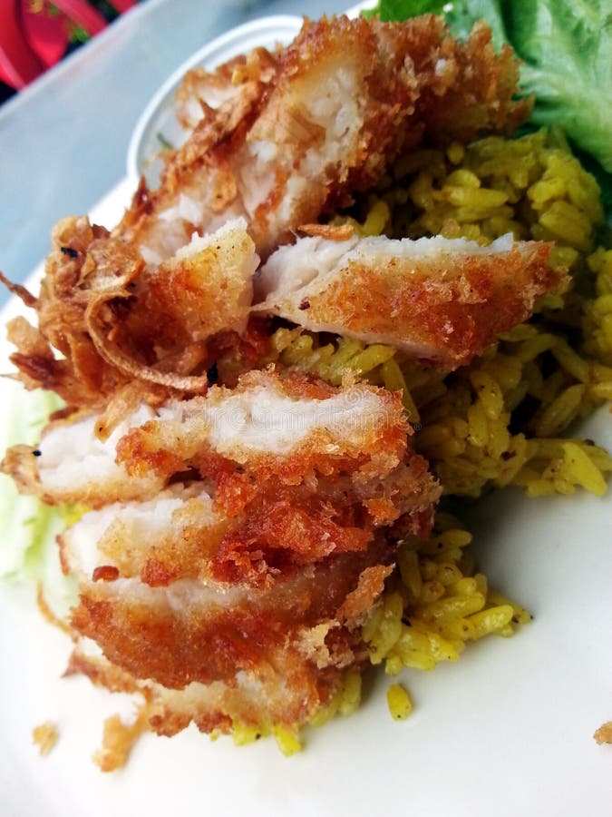Yellow Rice with Fried Chicken Stock Image - Image of luscious ...