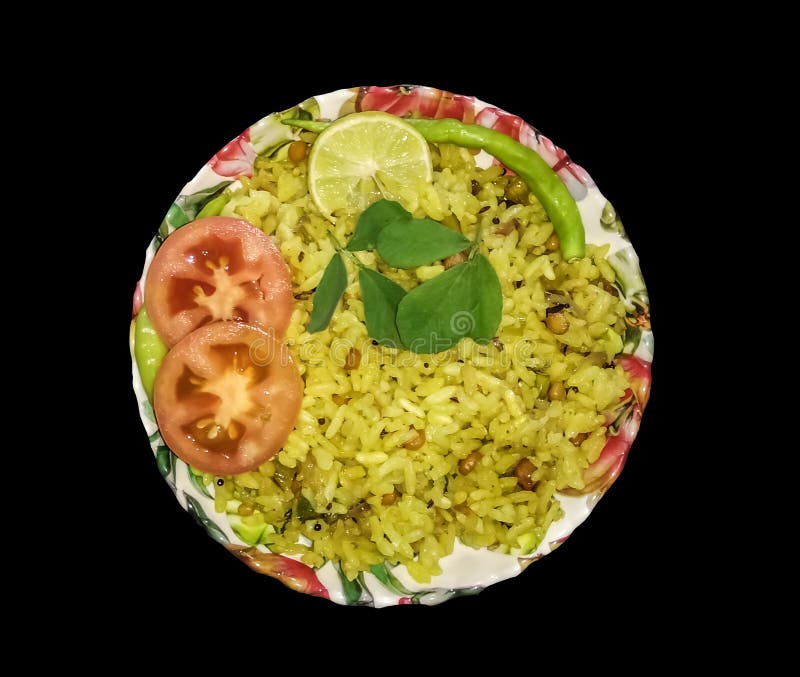 Yellow Rice Garnished with Tomato Lemon and Green Chillies Stock Image ...