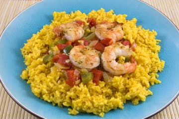 Yellow Rice and Shrimp on Blue Plate Stock Photo - Image of green ...