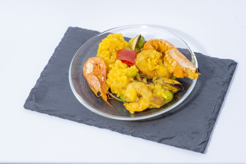 Yellow Rice with Shrimp, Fish and Vegetables Stock Photo - Image of ...