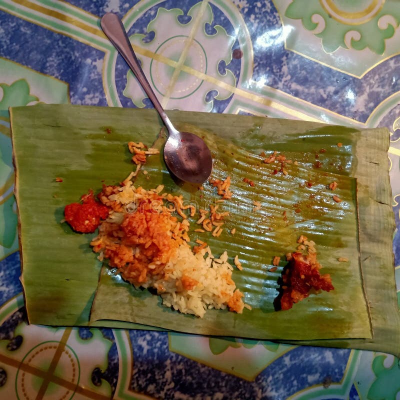 Yellow Rice with a Side Dish of Snakehead Fish from Borneo Stock Image ...