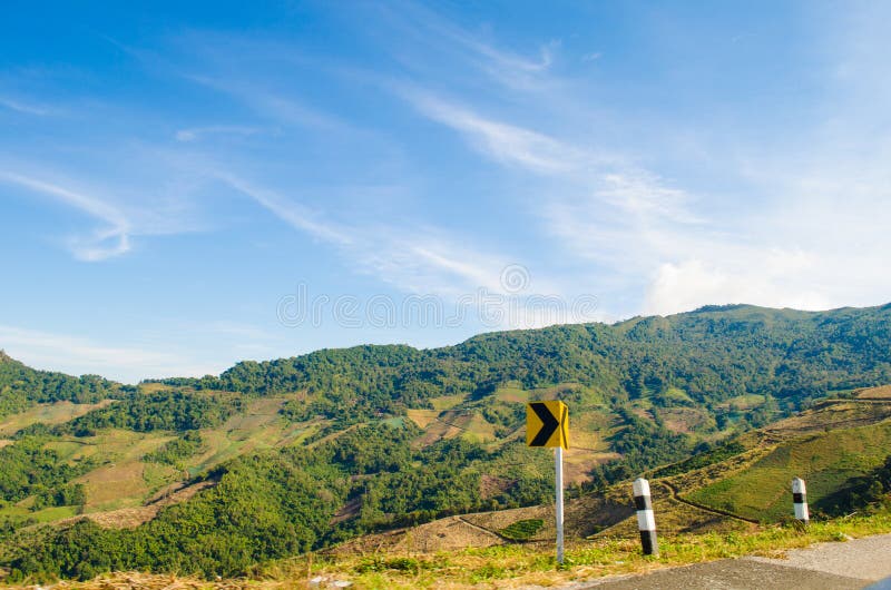 Yellow right curve sign stock photo. Image of journey - 79614788