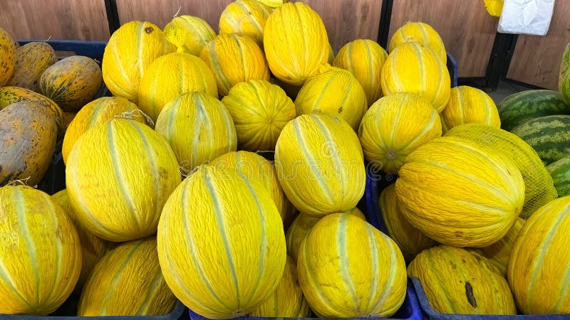 Yellow Ripe Melons in the Fruit Aisle at the Market Stock Image - Image ...