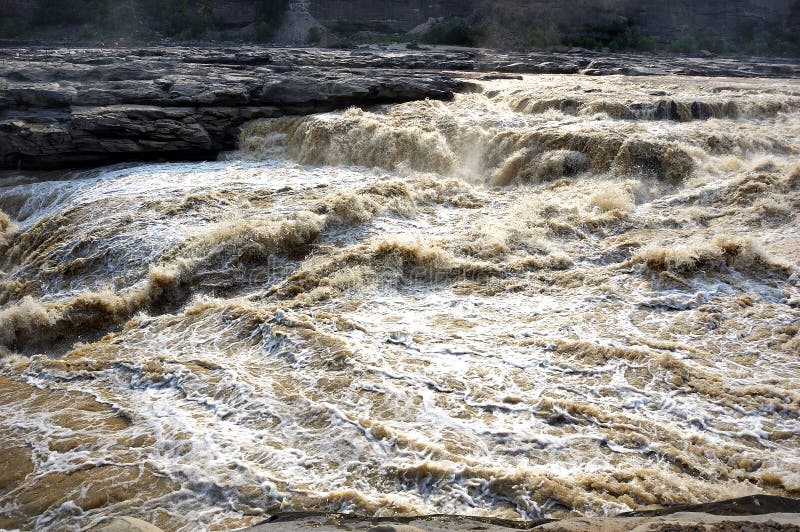 Yellow river stock image. Image of rock, natural, murmuring - 12896705