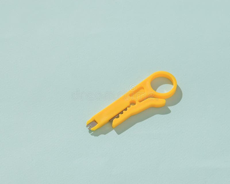 Yellow Rj-45 Cable Cutting Tool on a Light Background Stock Image ...