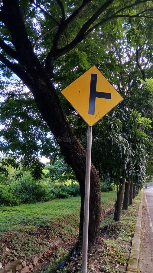 The Yellow Road Sign Indicates a Junction To the Right, Located at the ...