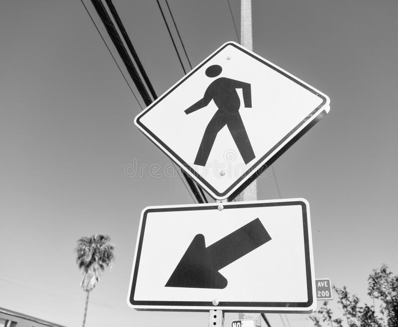 Yellow Road Sign for Pedestrian Directing this Way Stock Photo - Image ...
