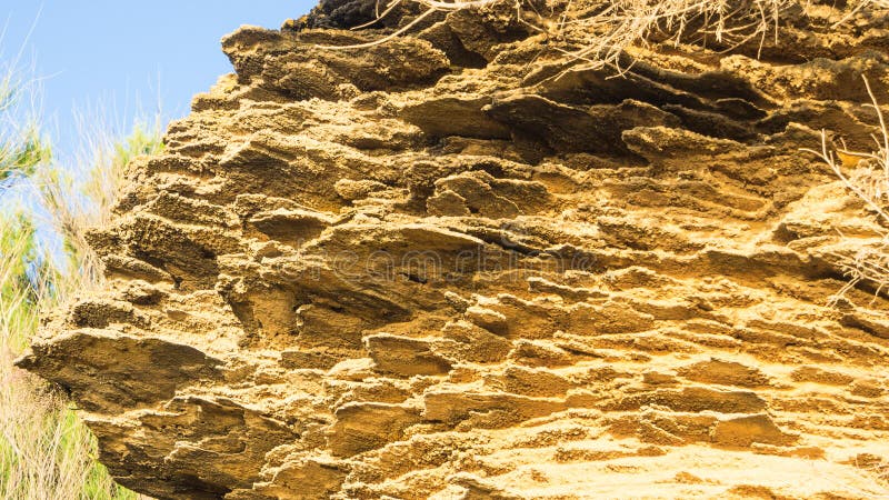 Yellow rock sediments stock image. Image of grungy, rock - 57047725