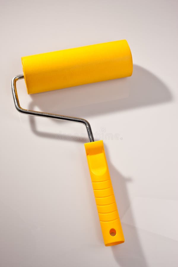 Yellow roller stock photo. Image of yellow, repair, plastic - 13456686