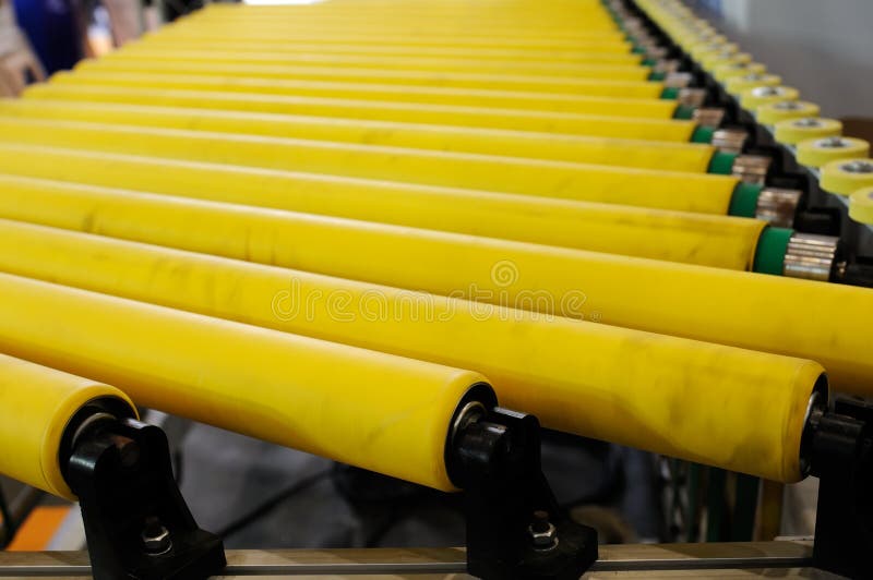 Yellow roller conveyer stock image. Image of iron, steel - 32478579
