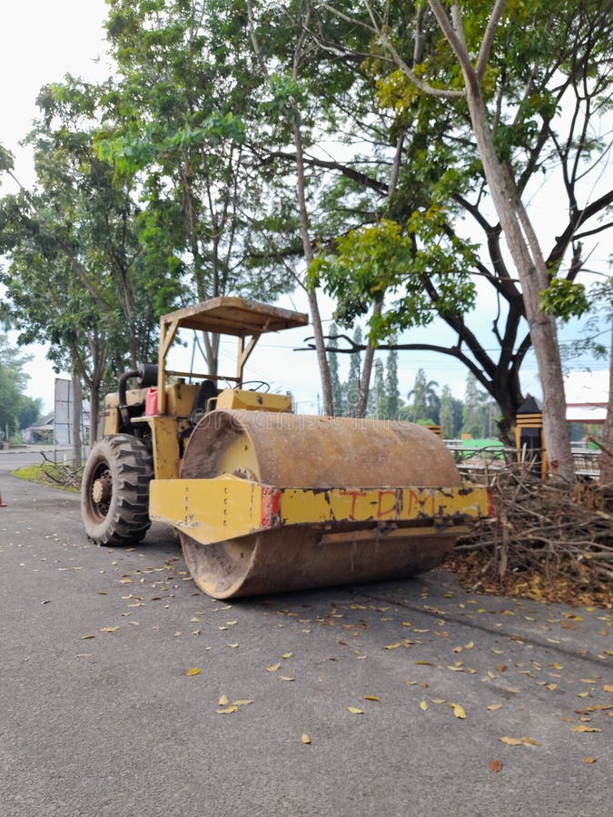 The Yellow Roller Heavy Equipment Feels on the Highway Stock Photo ...
