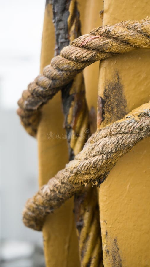 The Yellow Rope on a Yellow Metal Pole. Stock Photo - Image of tool ...