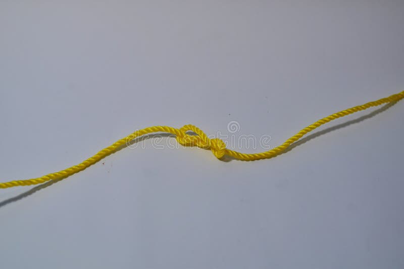 Yellow Ropes with Knot Isolated on White Background Stock Photo - Image ...