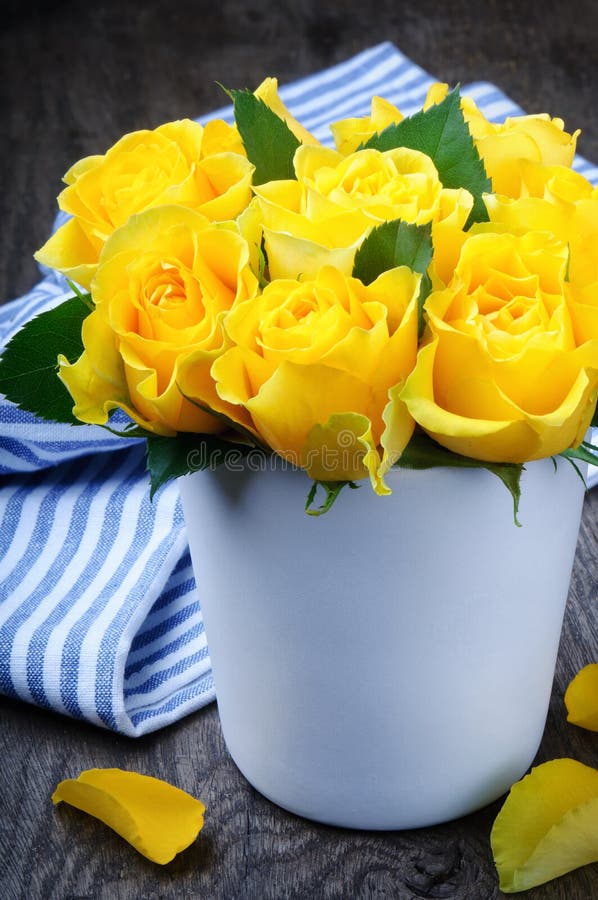 Yellow roses in a vase stock image. Image of birthday - 25109807