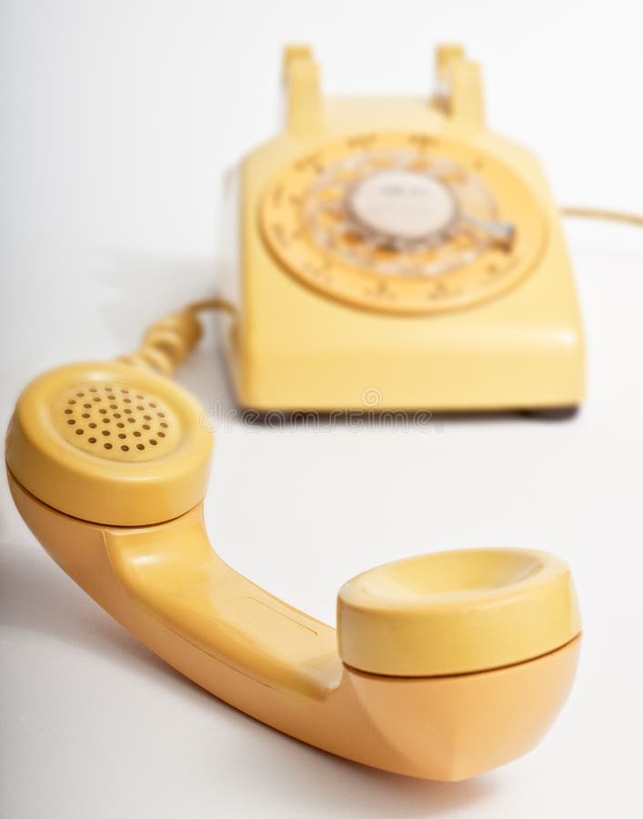 Yellow rotary telephone stock image. Image of communication - 22666891