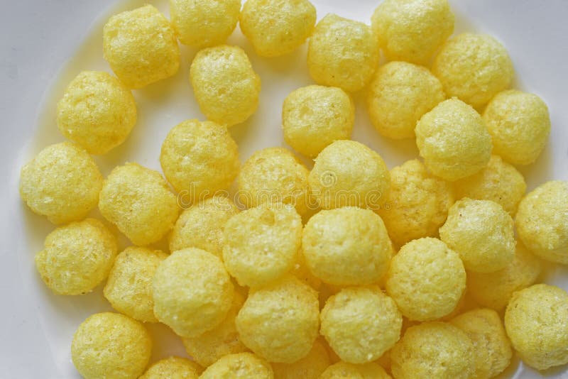 Yellow Round Corn Snacks with Cheese Flavor Stock Photo - Image of ...