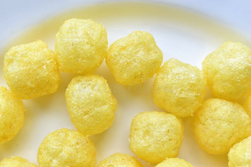 Yellow Round Corn Snacks with Cheese Flavor Stock Image - Image of ...