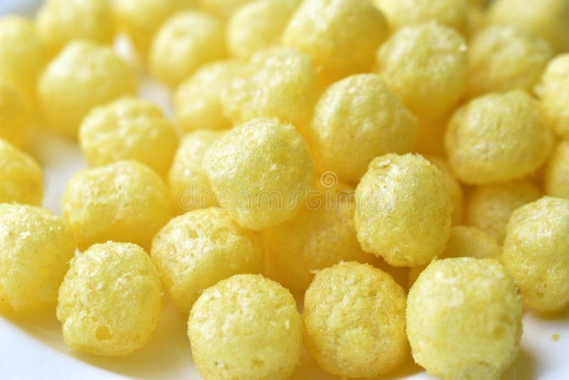 Yellow Round Corn Snacks with Cheese Flavor Stock Photo - Image of ...