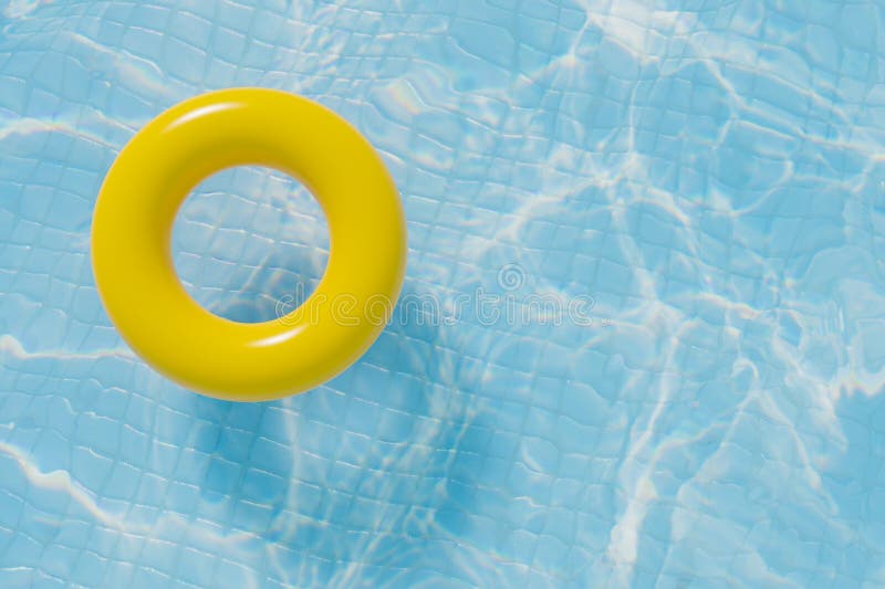 Yellow Round Donut Pool Float in a Bright Blue Swimming Pool Stock ...