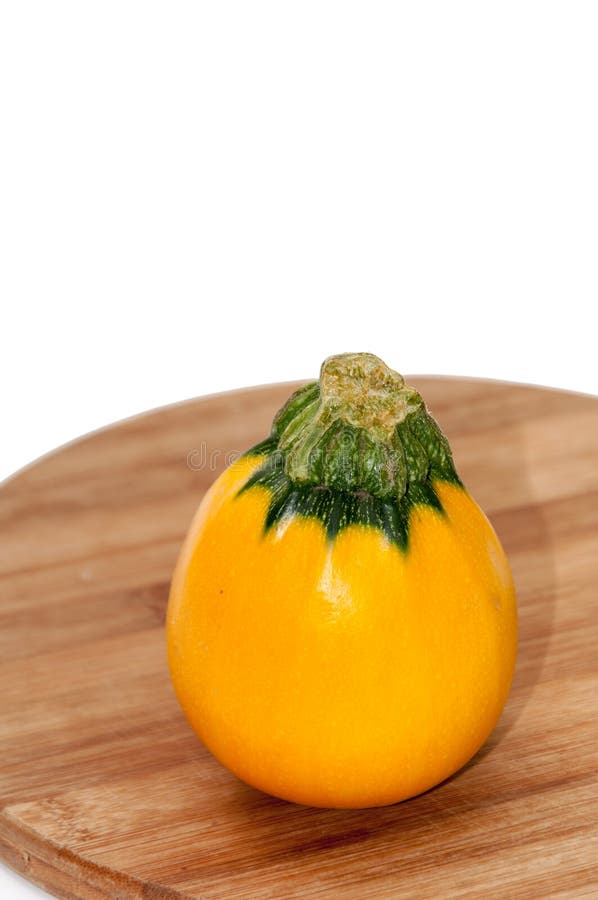 Yellow Round Zucchini on the Kitchen Wooden Board Stock Image - Image ...