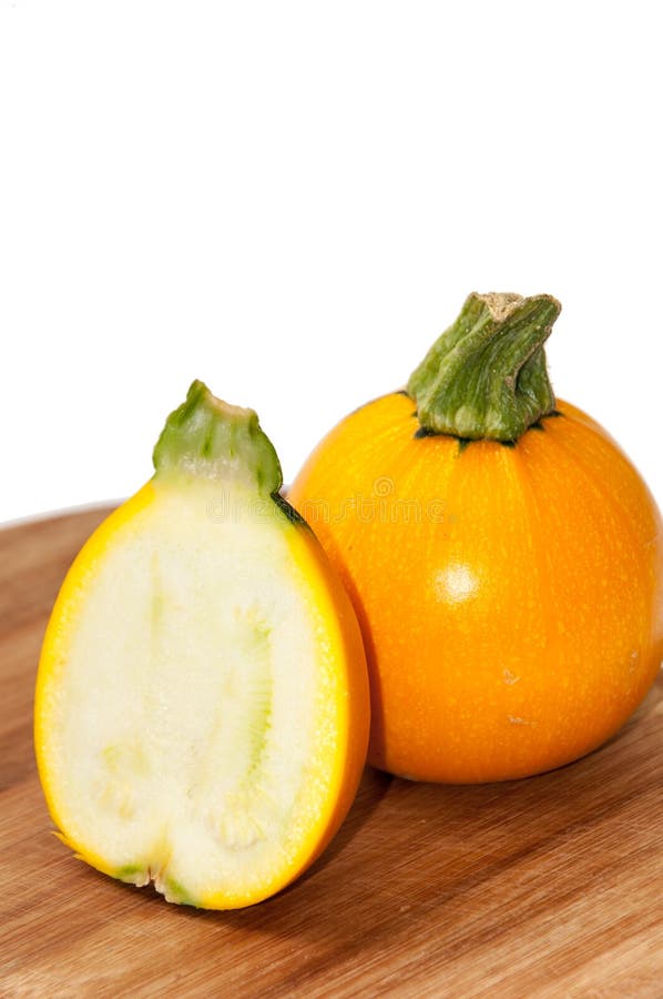 Yellow Round Zucchini Sliced on the Wooden Board Stock Image - Image of ...