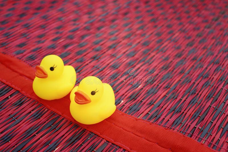 Yellow Rubber Duck on Background of Red. Stock Photo - Image of beach ...