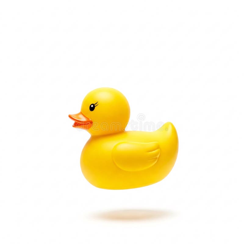Yellow Rubber Duck Falling on a White Background, Creating a Dynamic ...