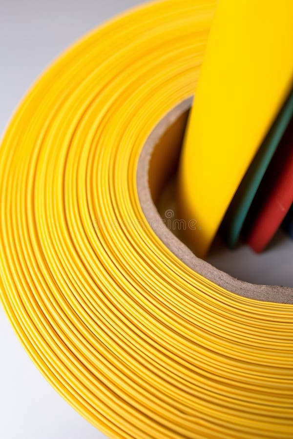 Yellow Rubber Insulation for Electrical Wires in a Roll Stock Photo ...